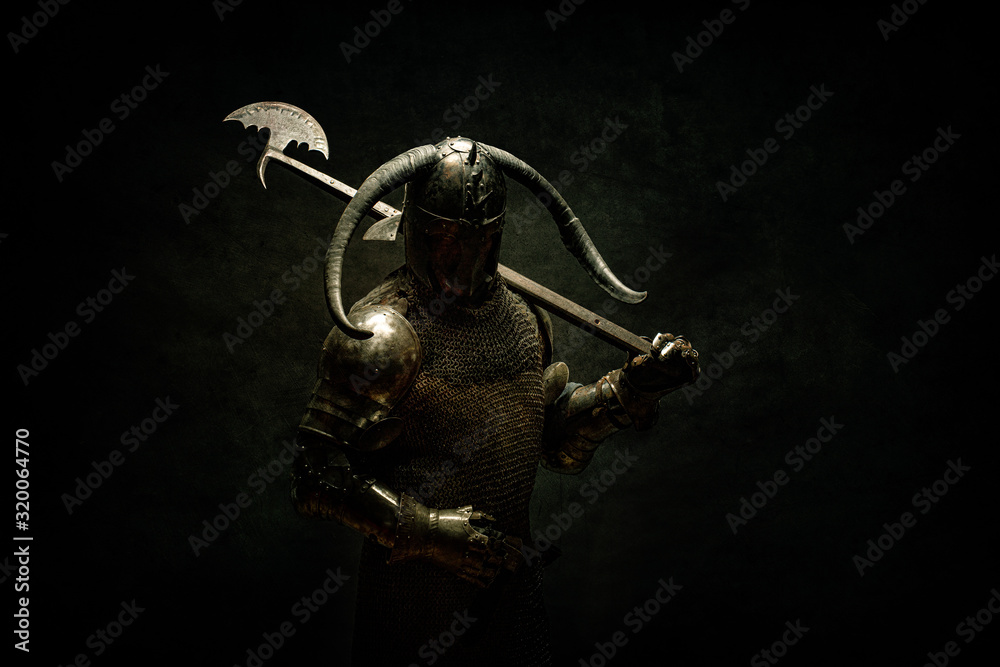 Portrait of a Viking Berserker warrior, holding a halberd on his ...