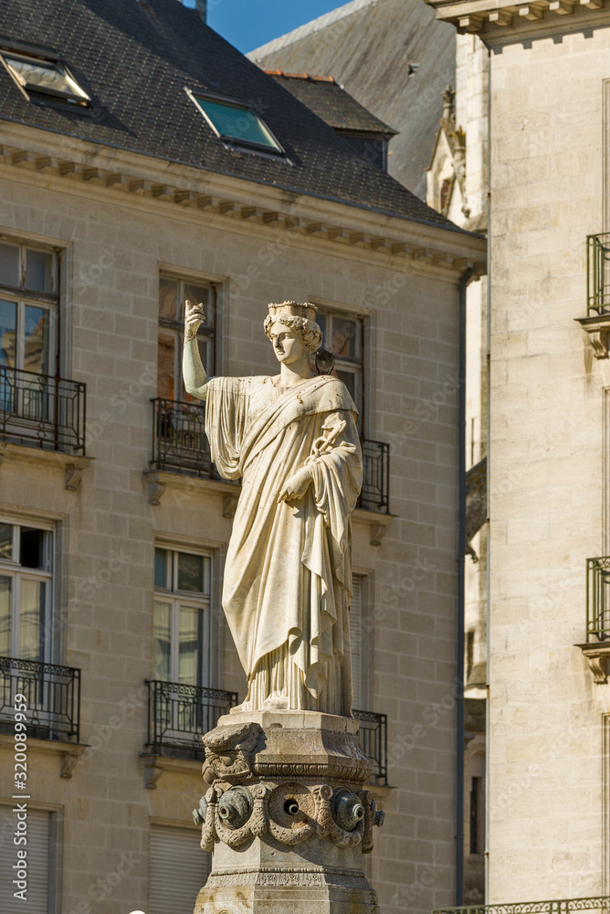 The city of Nantes is represented by a white marble statue with the ...