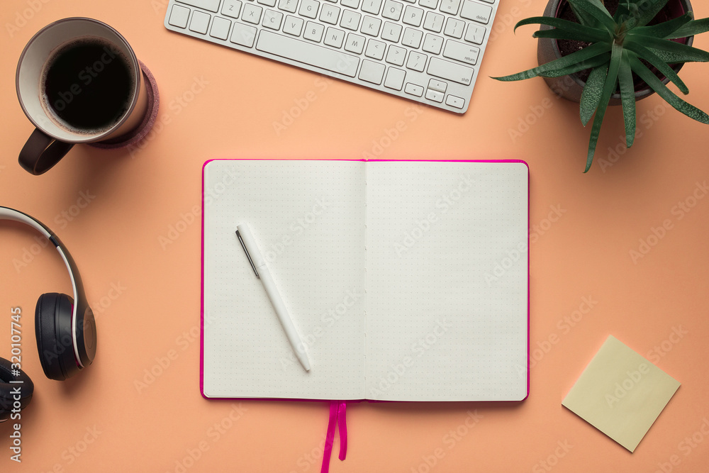 Stock photo of an open notebook page with a pencil in a coral ...