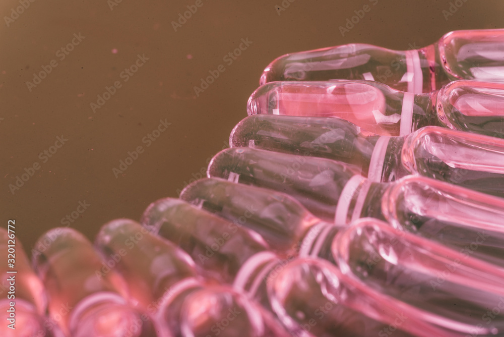 Glass medical ampoule vial for injection. Medicine is liquid sodium ...