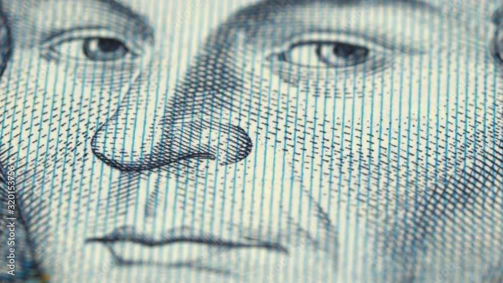 Nicolaus Copernicus portrait on Poland zloty banknote rotating. Genius ...