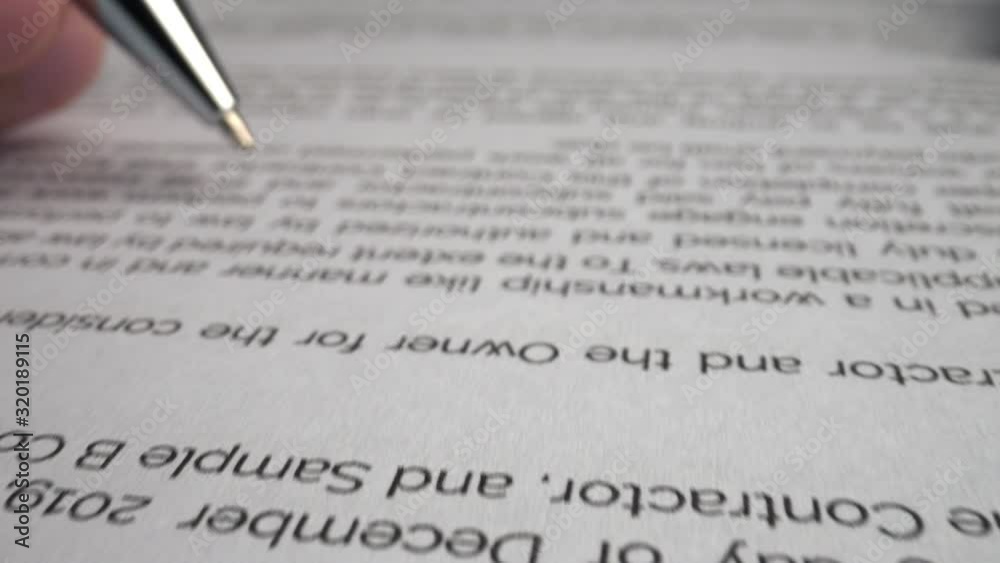 Businessman sign signature on document contract paper at office desk in ...