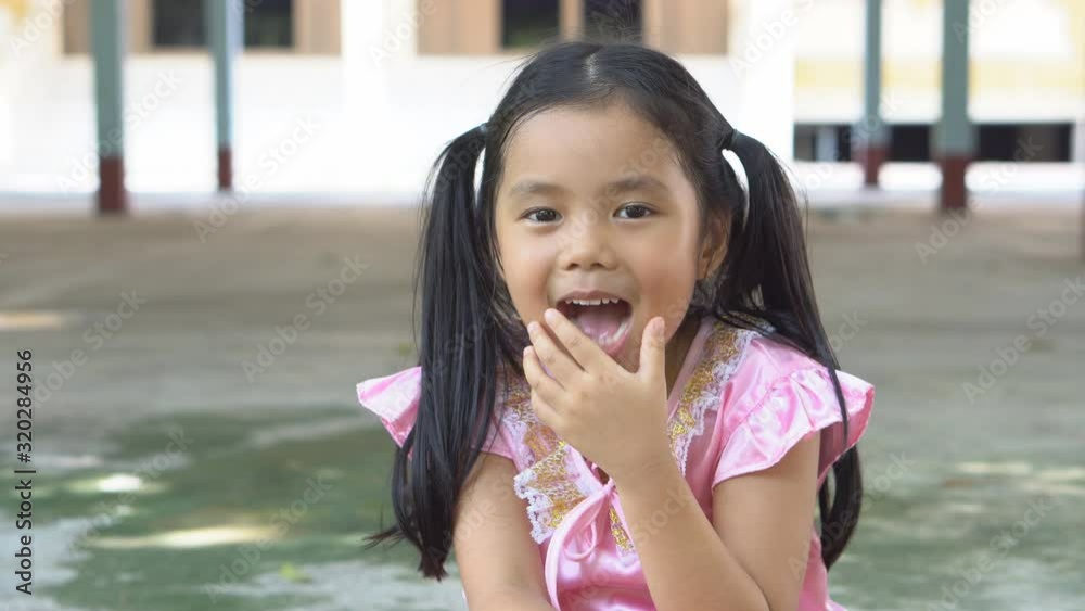 asian child cute or kid girl happy smiling with good mood laugh or ...