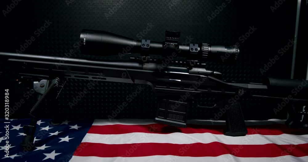 black Sniper Rifle with high powered Scope and ten round Magazine on ...