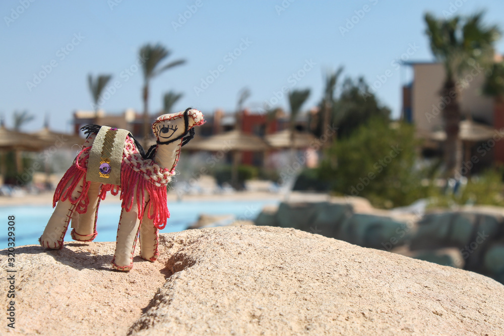 The toy camel is a symbol of Egypt and the Middle East. The ship of the ...