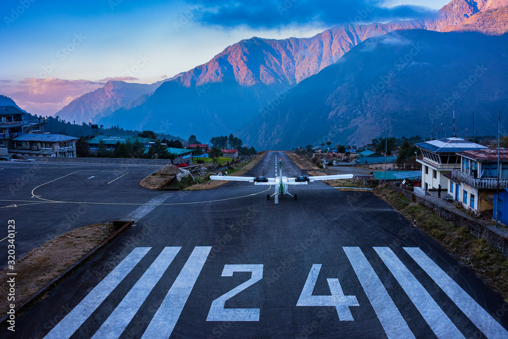 Lukla, NEPAL - December 2, 2019: Lukla airport. In the frame of the ...