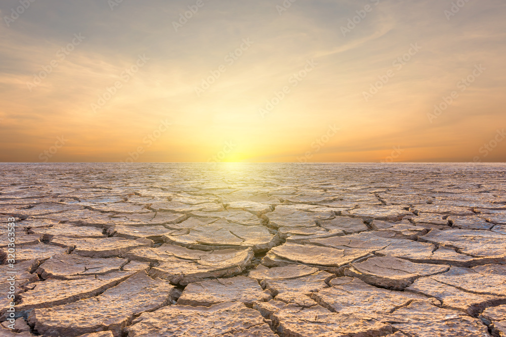 Landscape of soil drought cracked on sky sunset background Stock Photo ...