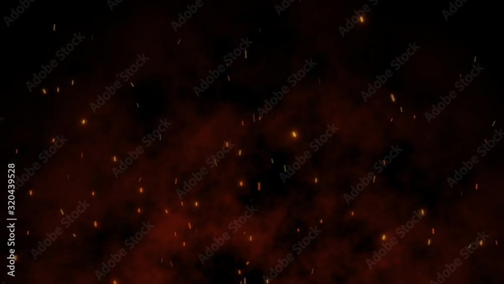 Burning hot sparks rising or flying up from the fire in the dark night ...