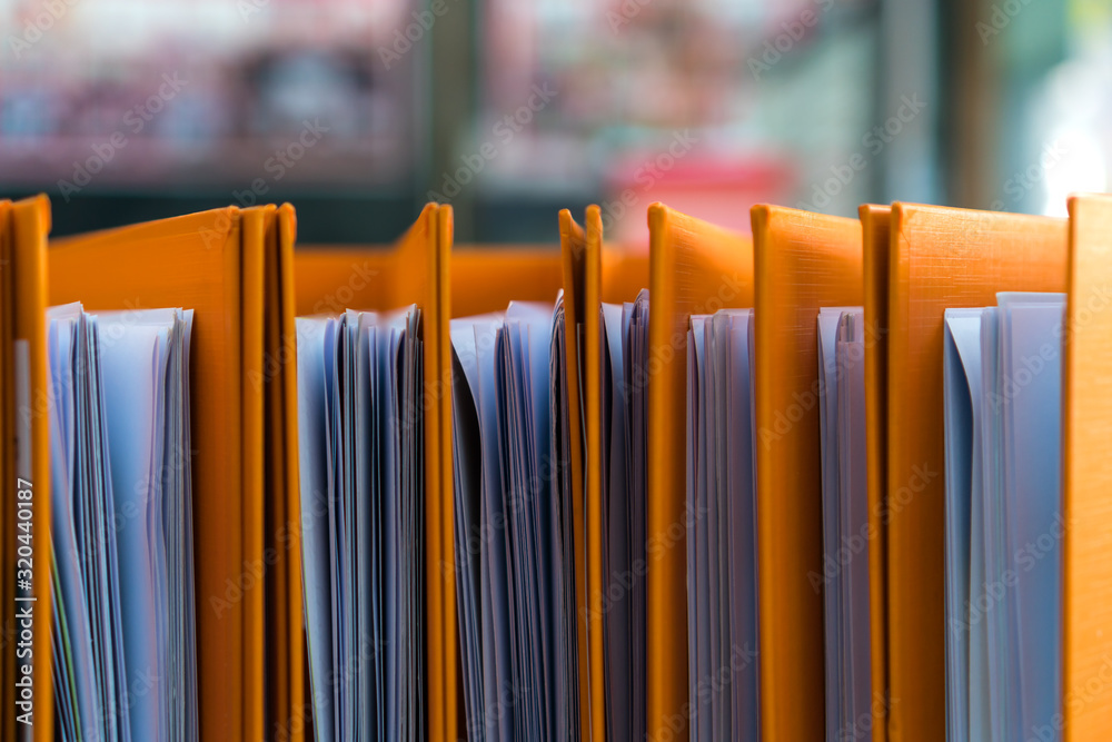 Documents Binder Paper, Orange Files folder on office desk, Annual ...