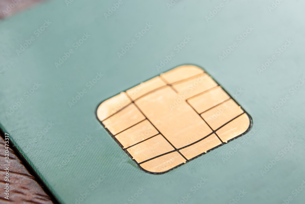 Micro credit card chip close-up, soft focus. New technologies, EMV chip ...