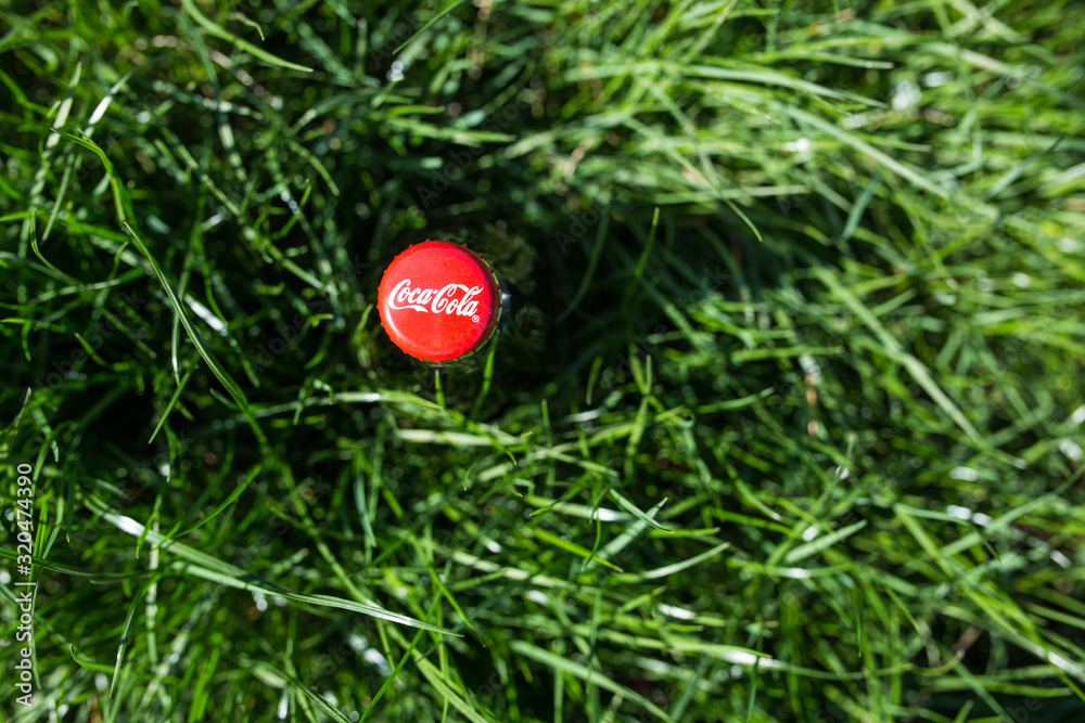 Coka -Cola - one of the favorite drinks in the world. The bottle lies ...