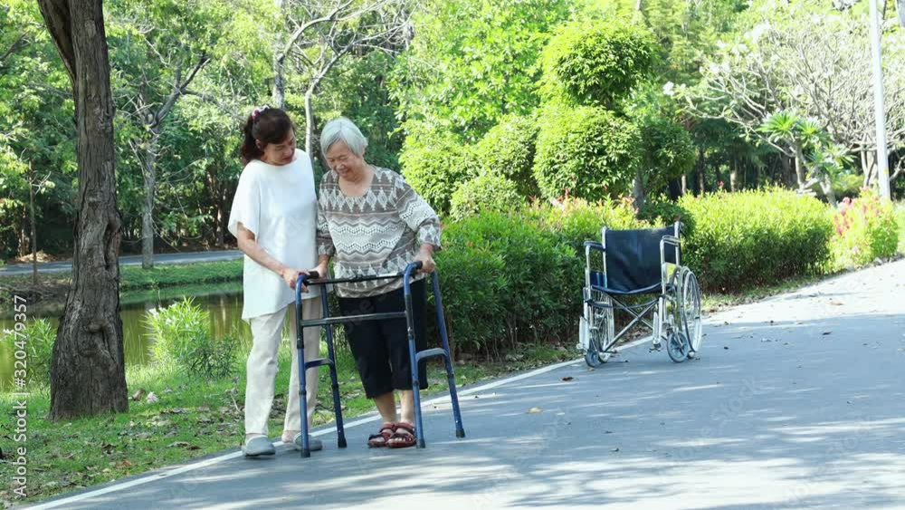 Asian senior woman use walking aid during rehabilitation,elderly people ...