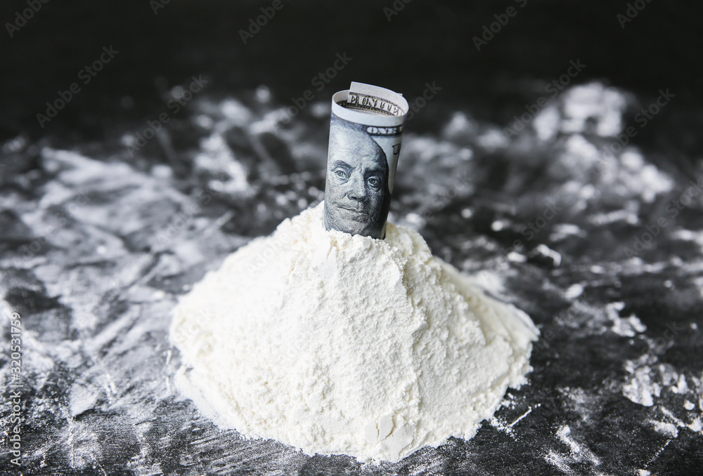 Cocaine with dollar notes on the table. Drugs addict dealer. Dangerous ...