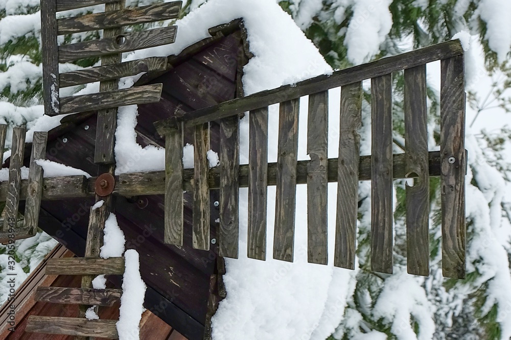 Vintage wooden windmill blades of restored retro windmill closeup in ...