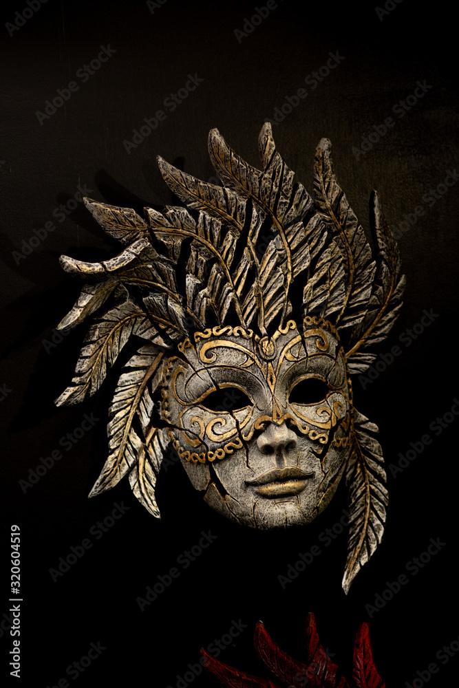 mask on black background Stock Photo | Adobe Stock