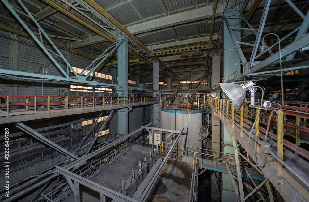 The interior of a closed waste incinerator plant. Huge units of the gas ...