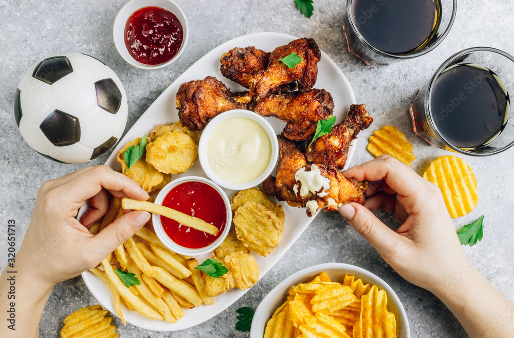 Table fof tasty snacks for beer prepared for watching sports on TV ...