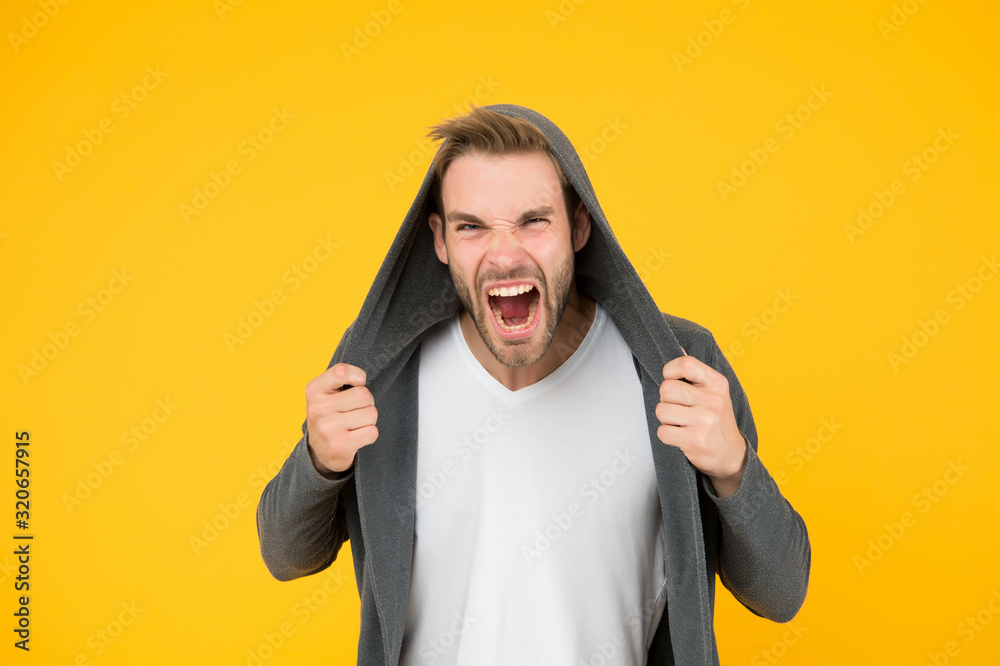 You make me angry. Angry man yellow background. Handsome guy in angry ...