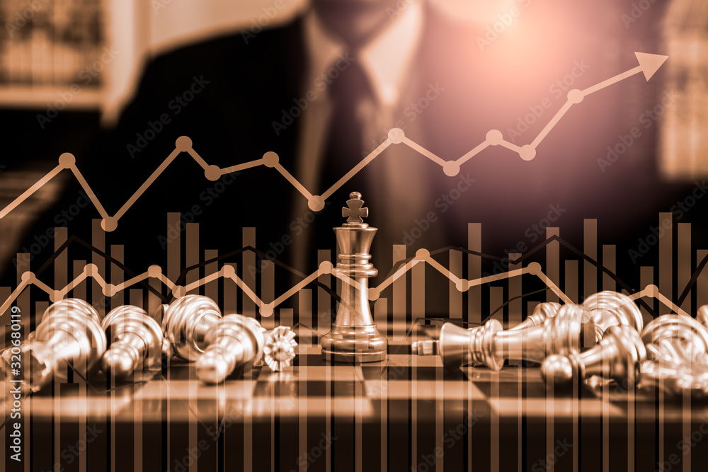 Chess game on chess board on stock market or forex trading graph chart ...