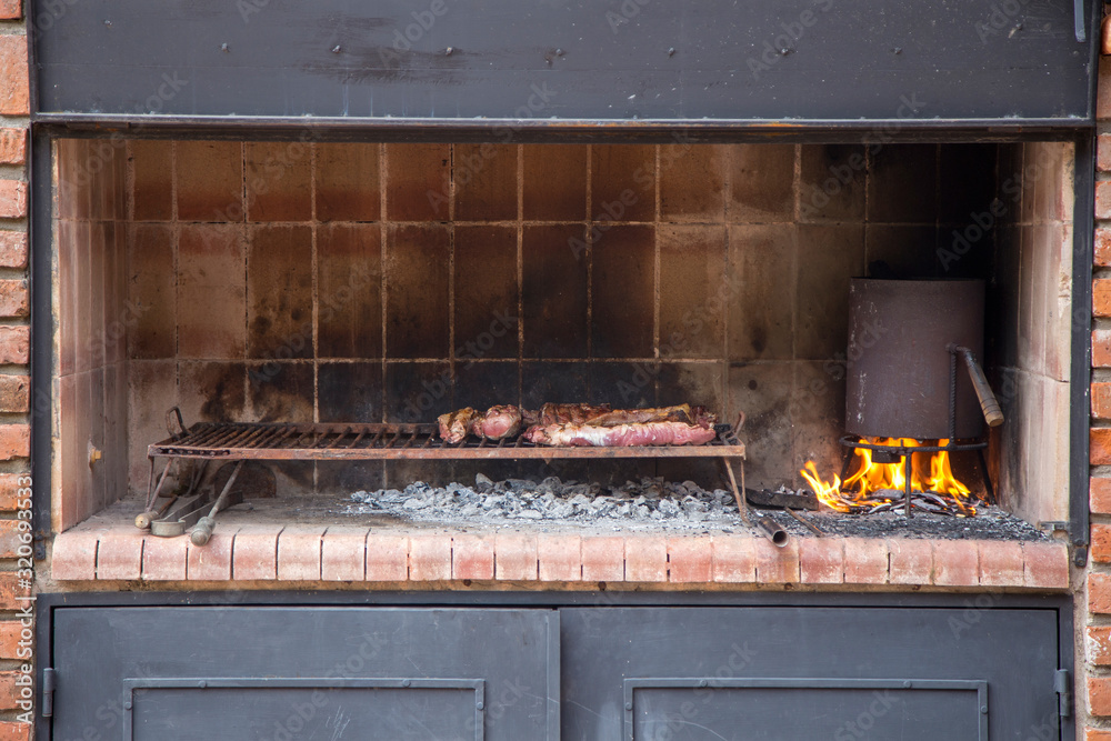 Barbecue. Asado. Argentine grill. Front view of traditional place to ...