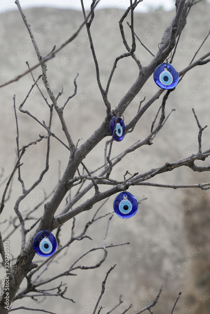Nazar - a traditional blue glass amulet from the evil eye attached to ...