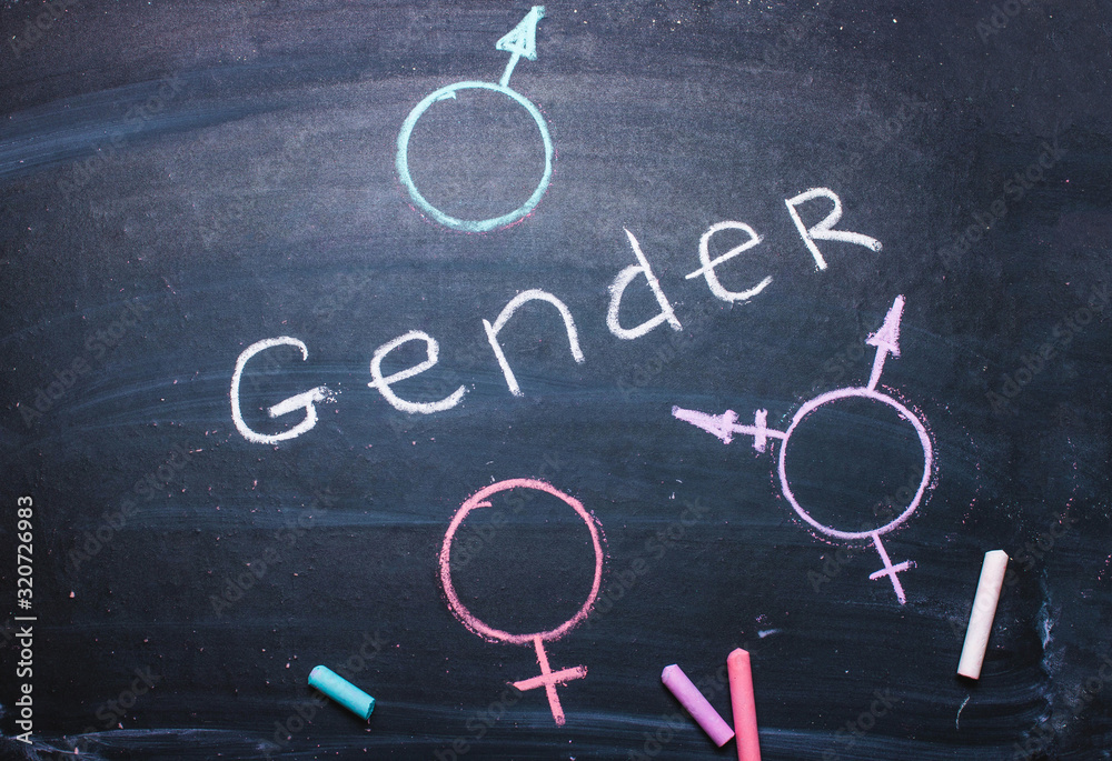 The word gender and symbols of man, woman, transgender Stock Photo ...