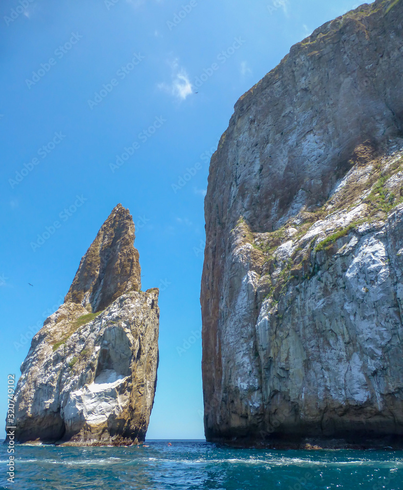 Kicker Rock island in the Galapagos Islands of Ecuador. You can snorkel ...