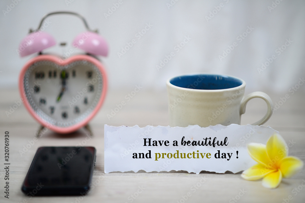 Inspirational quote - Have a beautiful and productive day. With blurry ...
