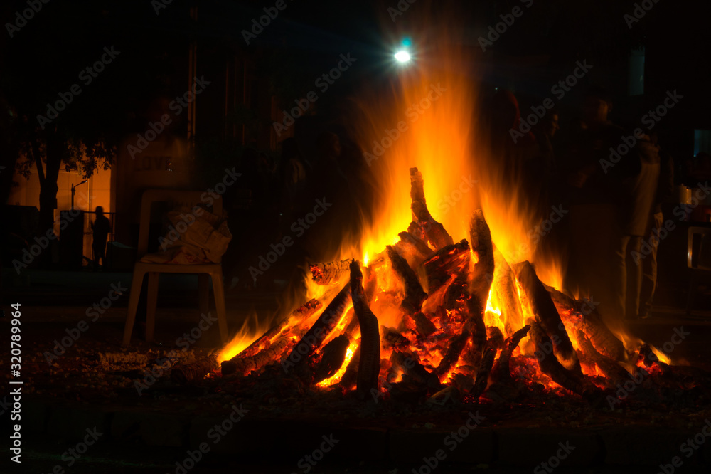 Giant bon fire lit for the festival of Lohri Stock Photo | Adobe Stock