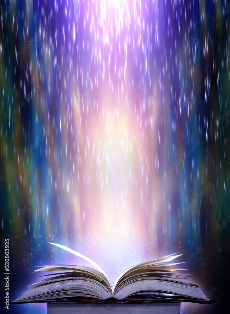 The book opens on a wooden table under the night sky in the light and ...