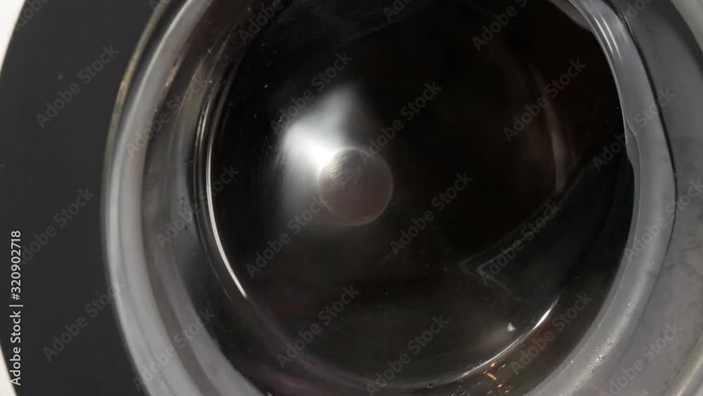 Cylinder Spinning of washing machine. Loaded Washing Machine. Concept ...