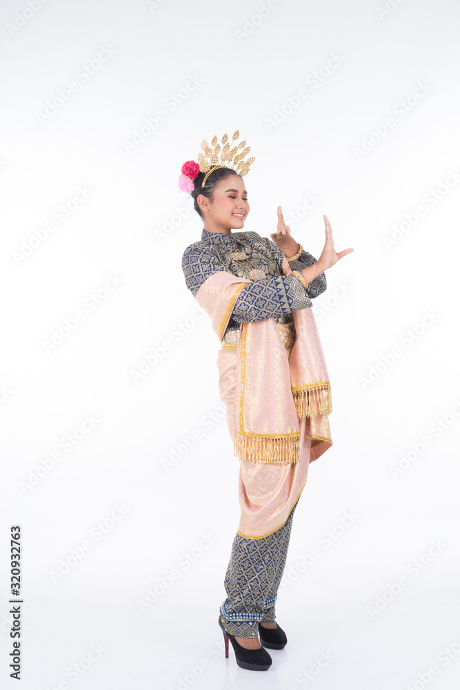 A beautiful Malaysian traditional female dancer performing the dance ...