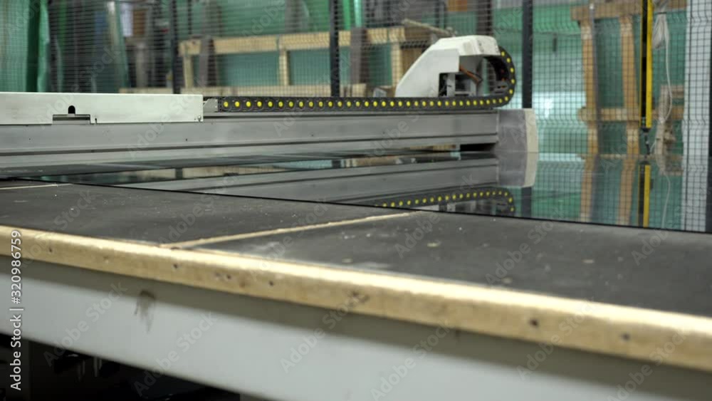 Big industry glass sheet cutting table in the factory. Cutting big ...