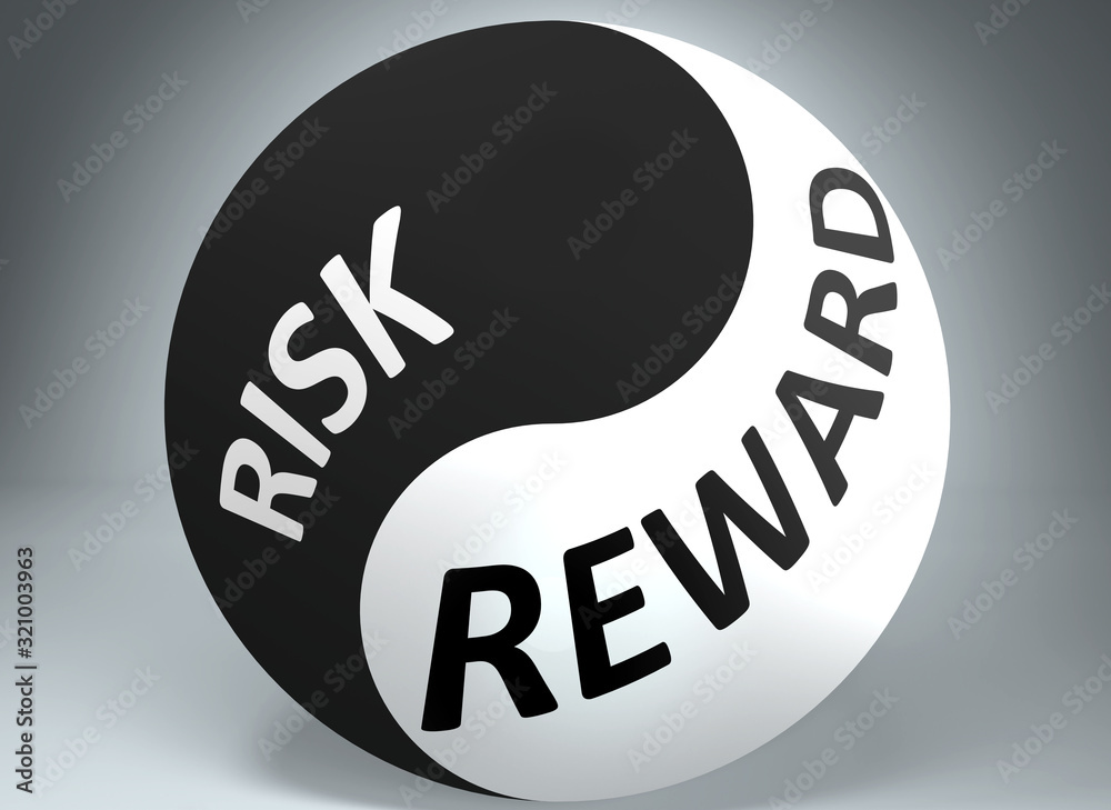 Risk and reward in balance - pictured as words Risk, reward and yin ...