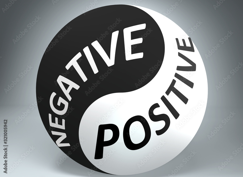 Negative and positive in balance - pictured as words Negative, positive ...
