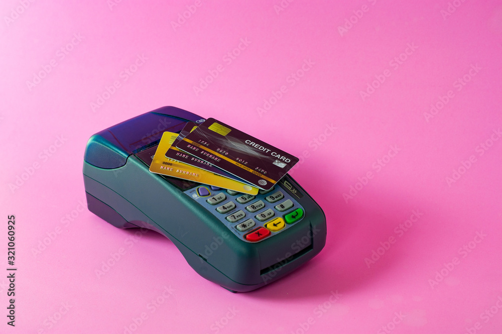 Credit card and credit card scanner on a pink background Stock Photo ...