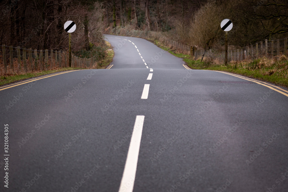 open road in Enlgland and speed limit signs Stock Photo | Adobe Stock
