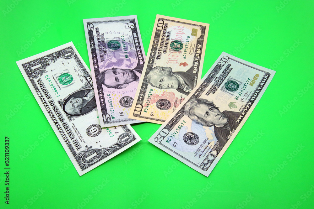 American paper money background. Banknotes in denominations of 1, 5, 10 ...