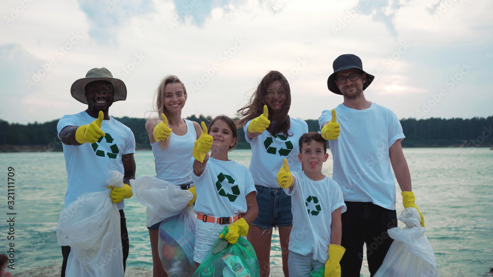 Happy multi-race young people children and adults environment ...