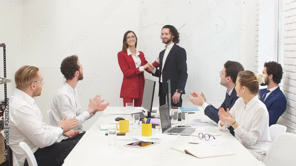 friendly and beautiful caucasian business people gathered to discuss ...