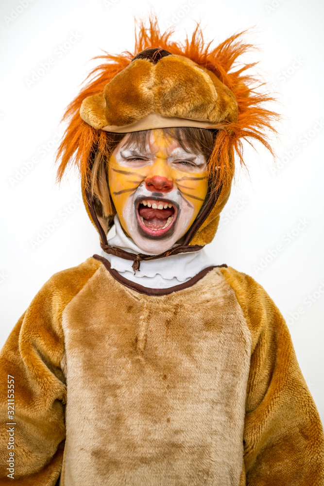 Girl dressed as a lion for the masquerade Stock Photo | Adobe Stock