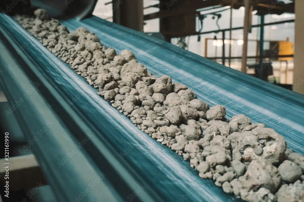 Clay conveyor line for brick production. Stock Photo | Adobe Stock