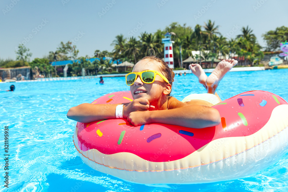 Tween girl in water park Stock Photo | Adobe Stock