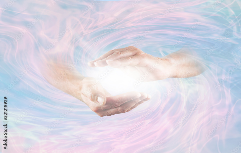 Working with Powerful Divine Energy - male hands emerging from blue ...