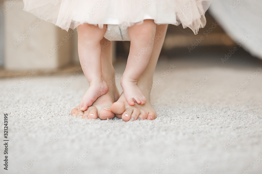 Little baby`s toes and feet in front. Close up still of child`s feet ...
