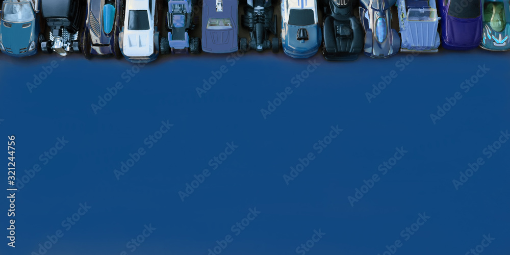 Horizontal blue banner with number of different blue toy models of cars ...