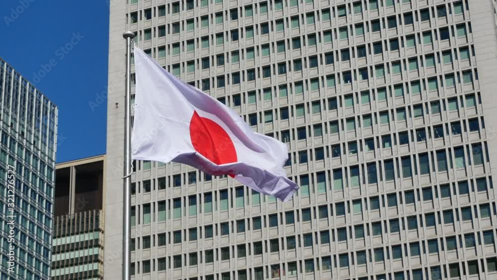 Japan flag with background of modern high-rise building in Tokyo,Japan ...