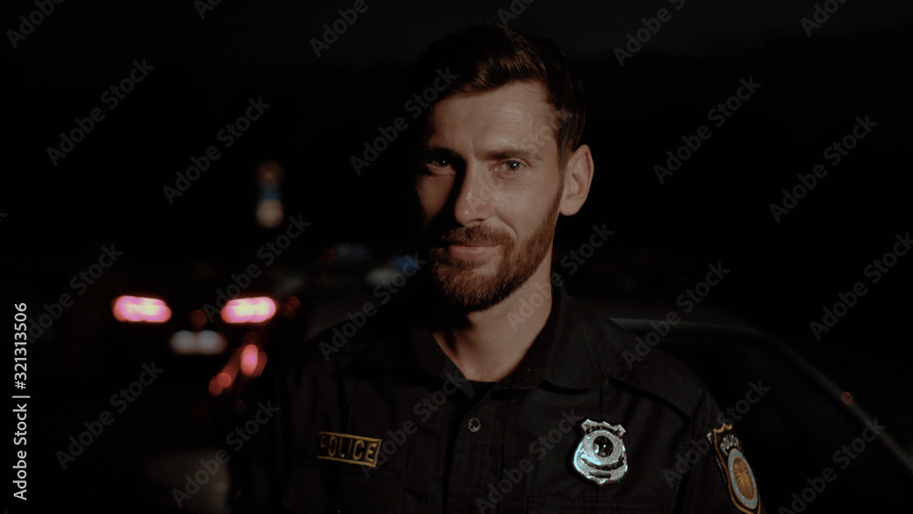 Zoom in portrait of attractive positive american cop smiling joyfully ...