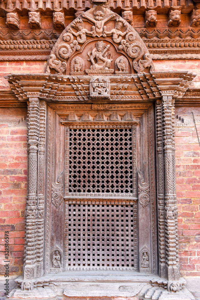 Artwork of a wondow at the temple in Durban square on Patan near ...