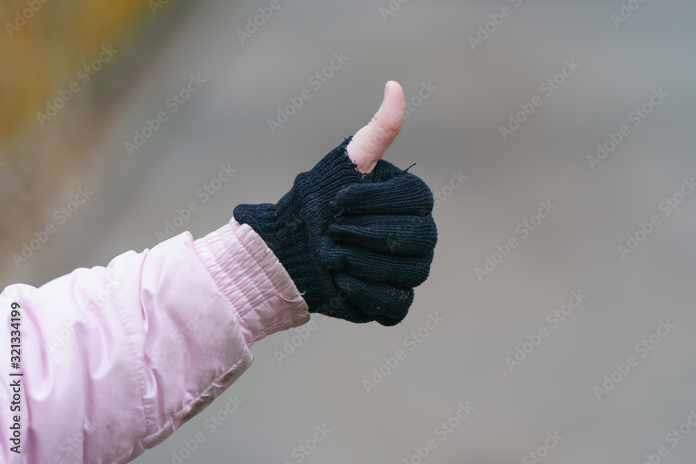 Sign language. Hand thumb up symbol or sign of help or favor or ...